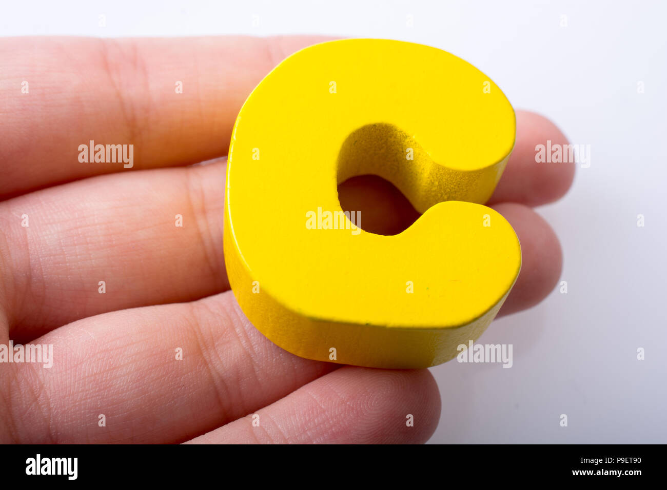 Letter cube of C of Alphabet made of wood Stock Photo - Alamy