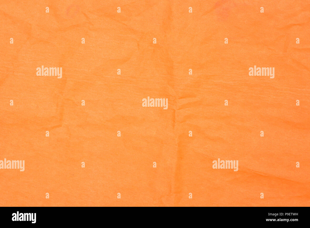orange color creased tissue paper background texture Stock Photo - Alamy