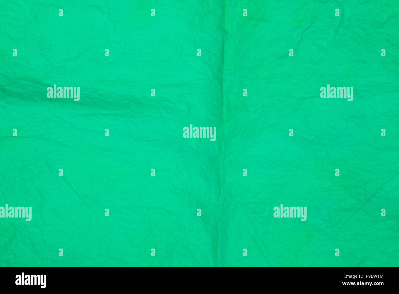 green color creased tissue paper background texture Stock Photo - Alamy