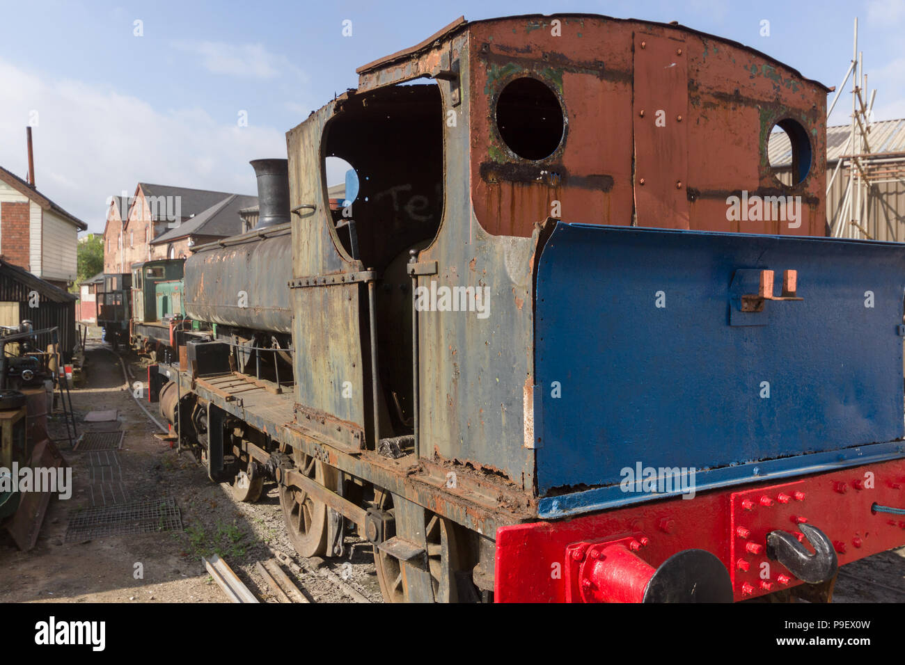 A derelict and rusting steam engine at the Cambrian Heritage Railway ...