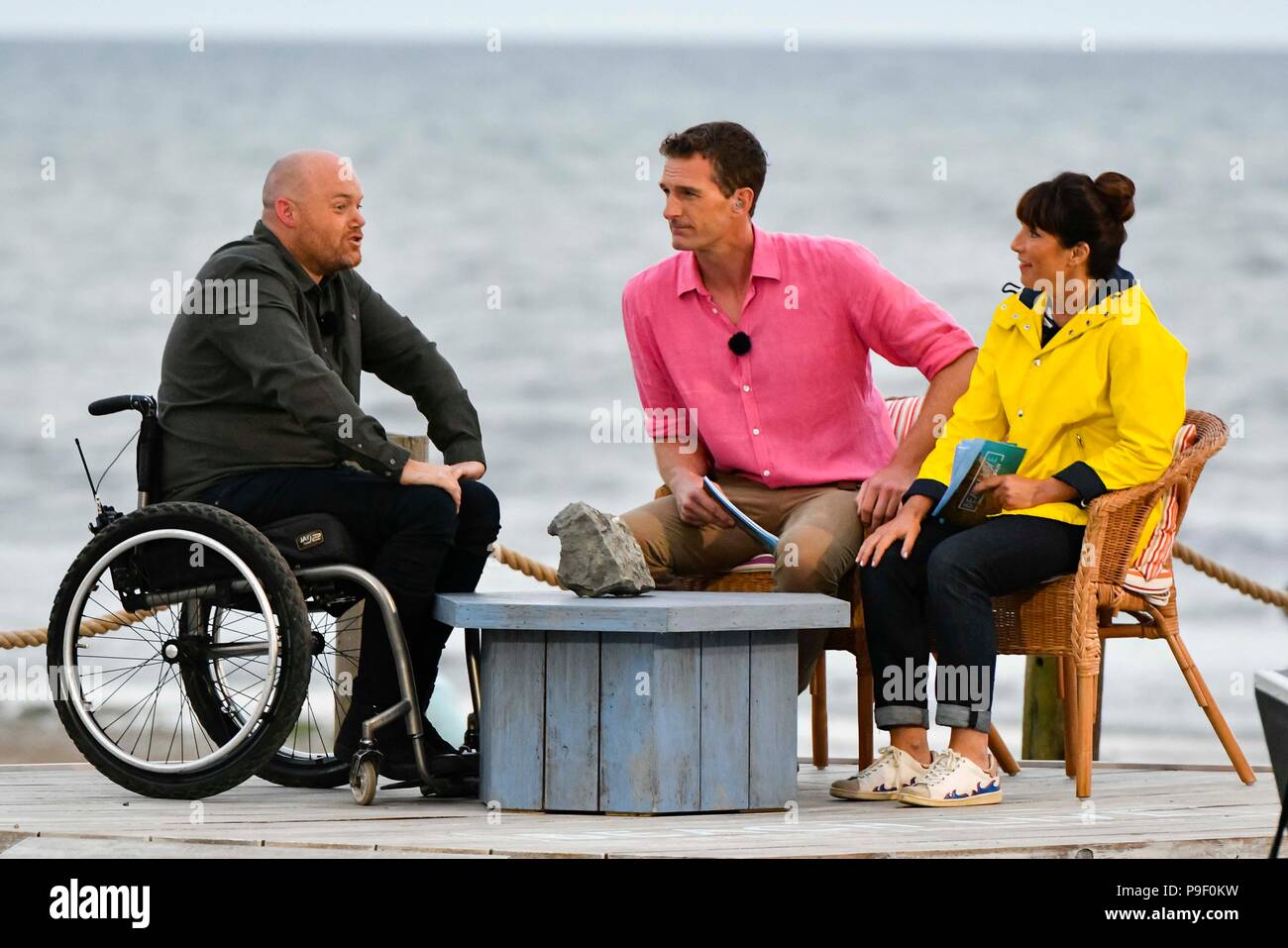 Charmouth, Dorset, UK. 17th July 2018. Presenters, historian Dan Snow ...