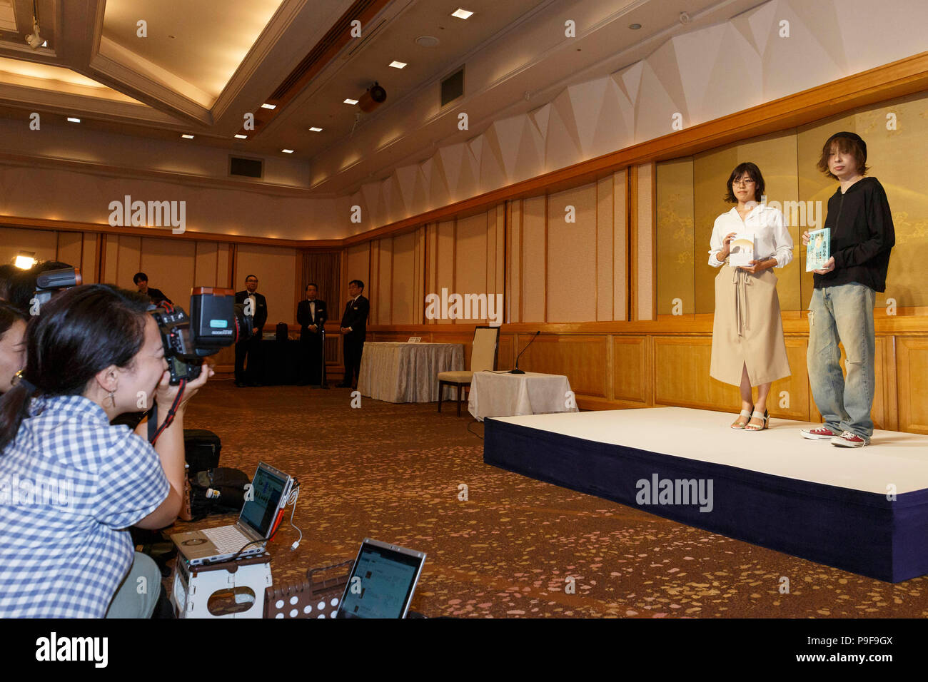 The 159th Naoki Prize winner Rio Shimamoto (L) and the Akutagawa Prize ...