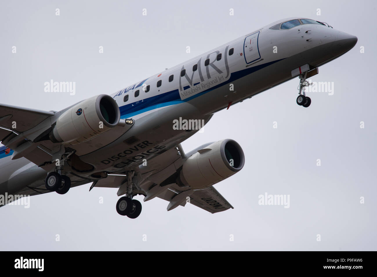 Mitsubishi MRJ90 airliner jet plane flying at the Farnborough ...