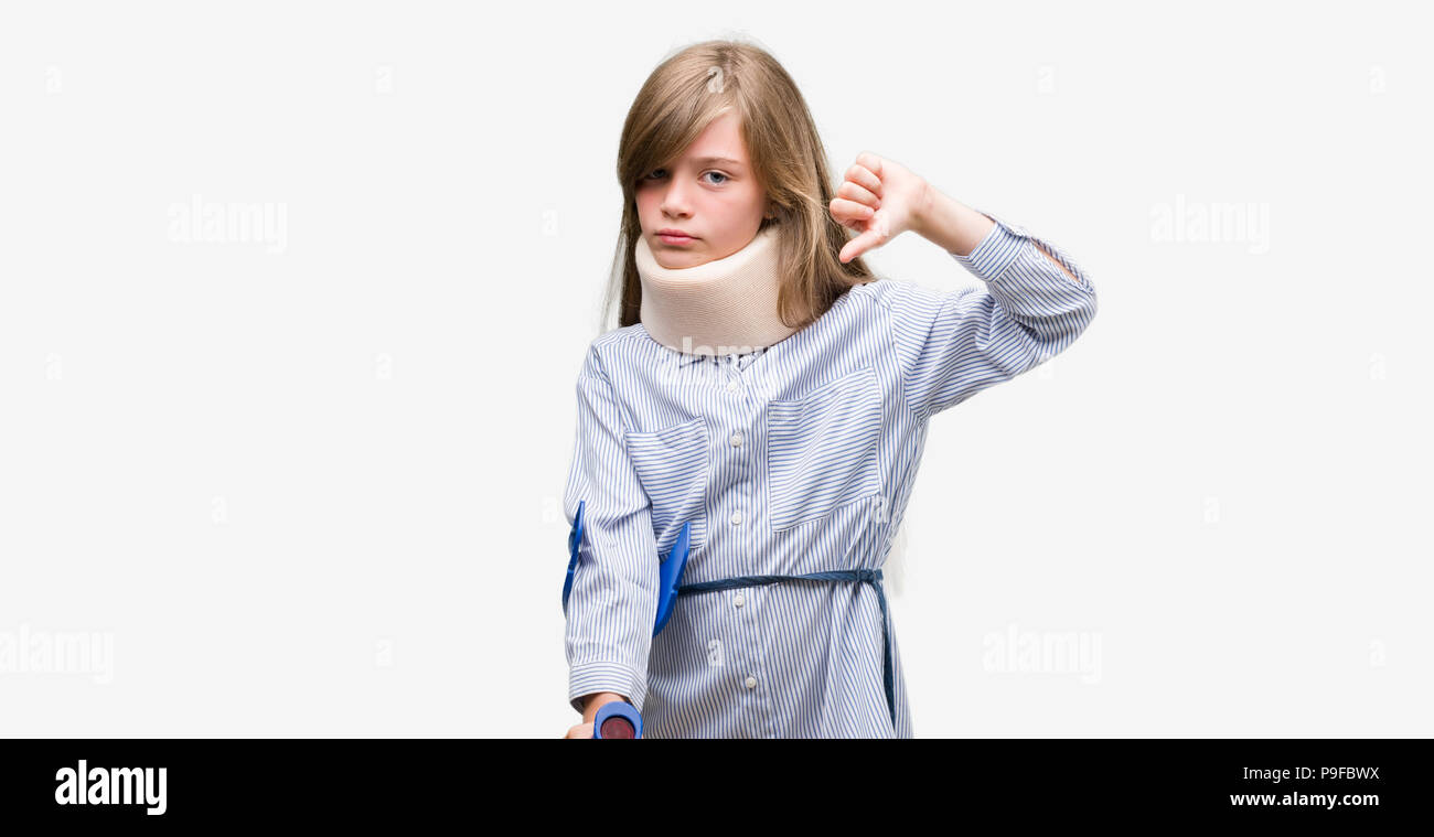 Young blonde child injured wearing neck collar and crutches with angry ...