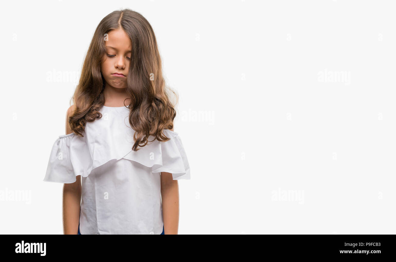 Brunette hispanic girl depressed and worry for distress, crying angry ...