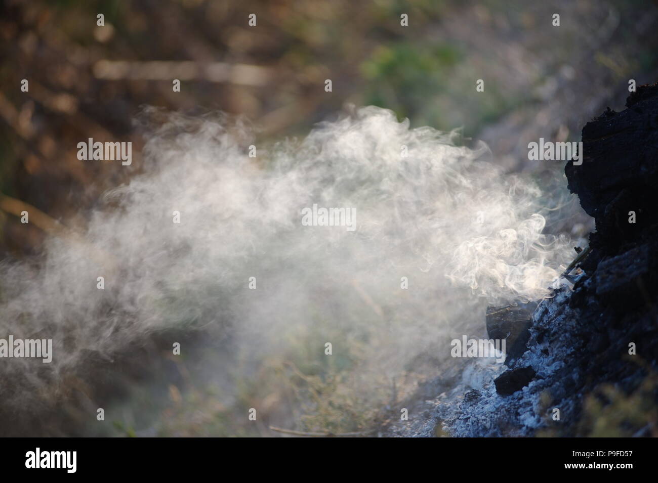 Thick White Floating Smoke Stock Photo - Alamy