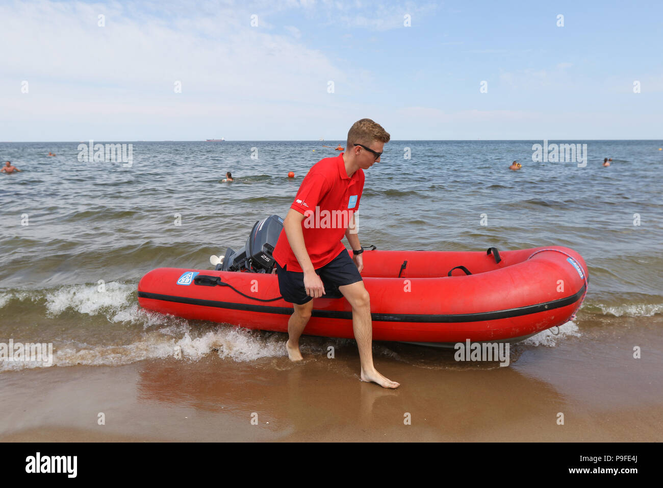 Lifeguard run in water hi-res stock photography and images - Alamy