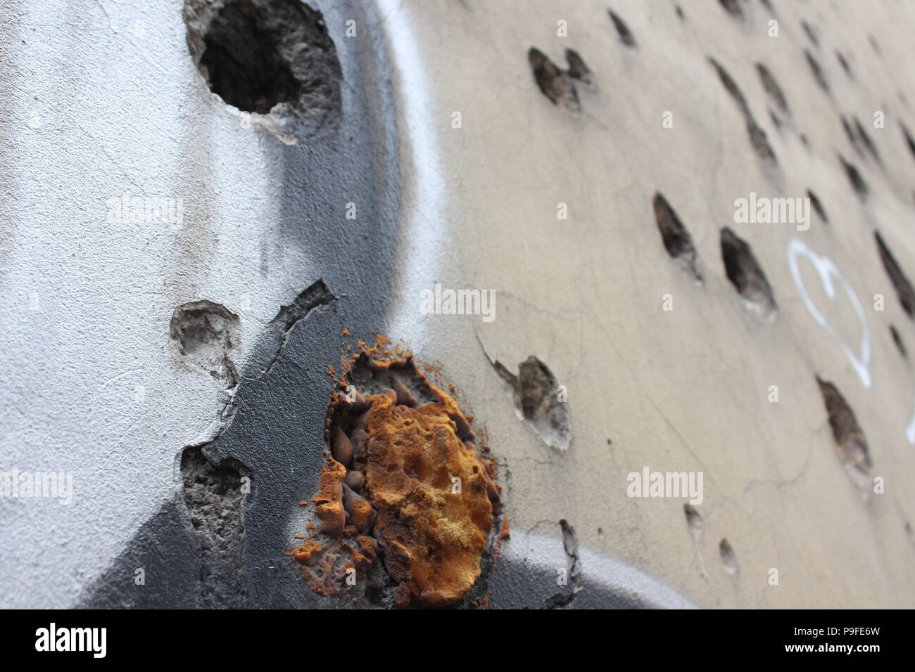 Bullet marks in wall hi-res stock photography and images - Alamy