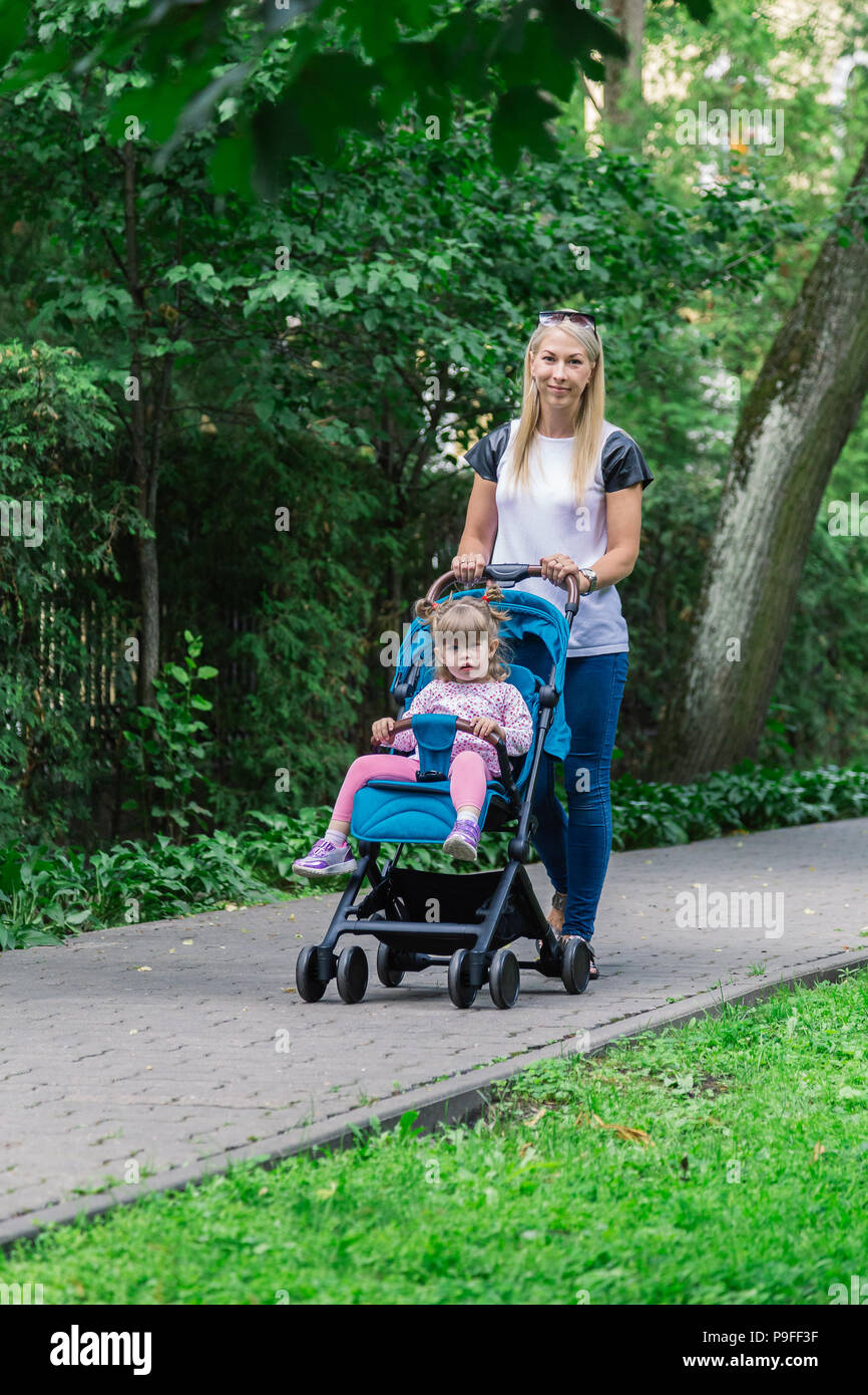 Couple and pushing pram and park hi-res stock photography and images ...