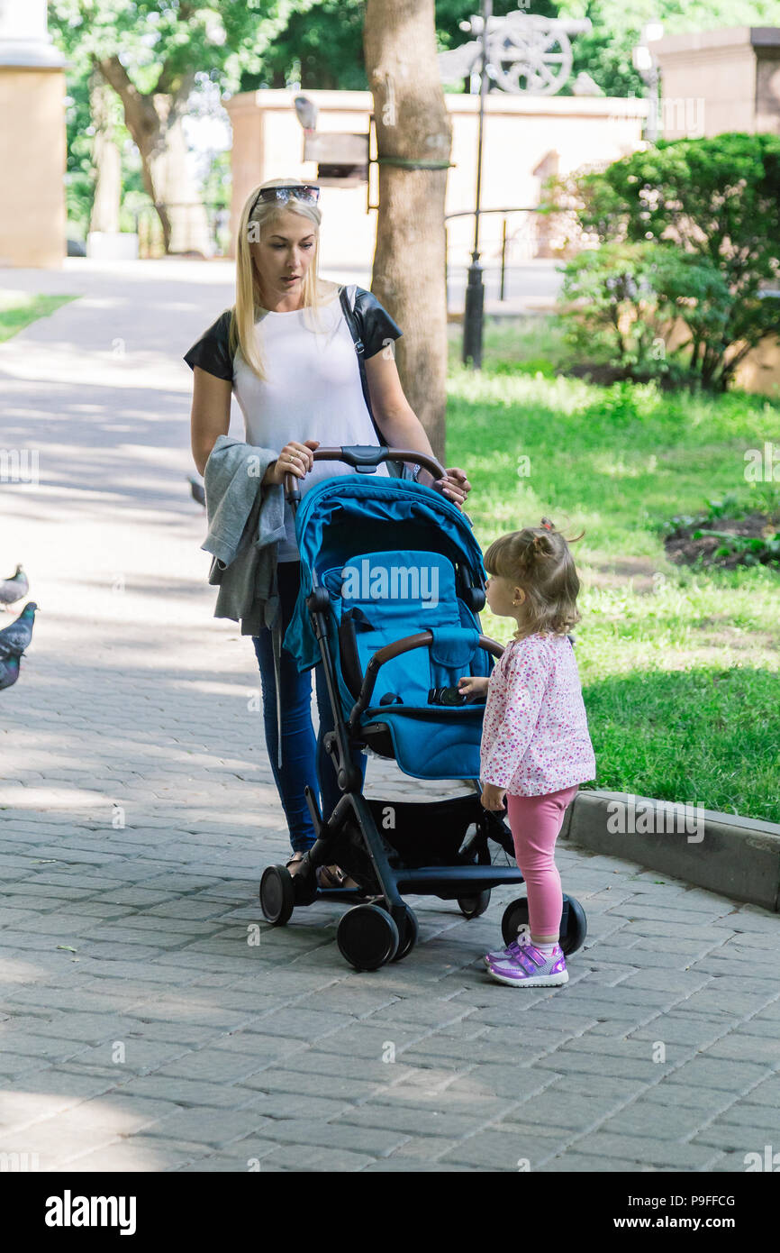 Couple and pushing pram and park hi-res stock photography and images ...