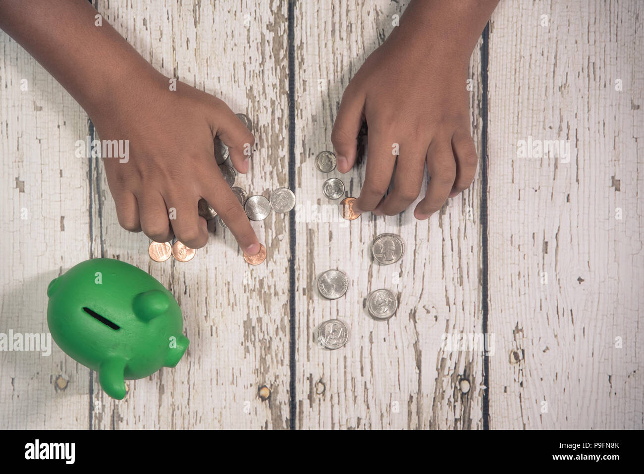 Counting pennies hi-res stock photography and images - Alamy