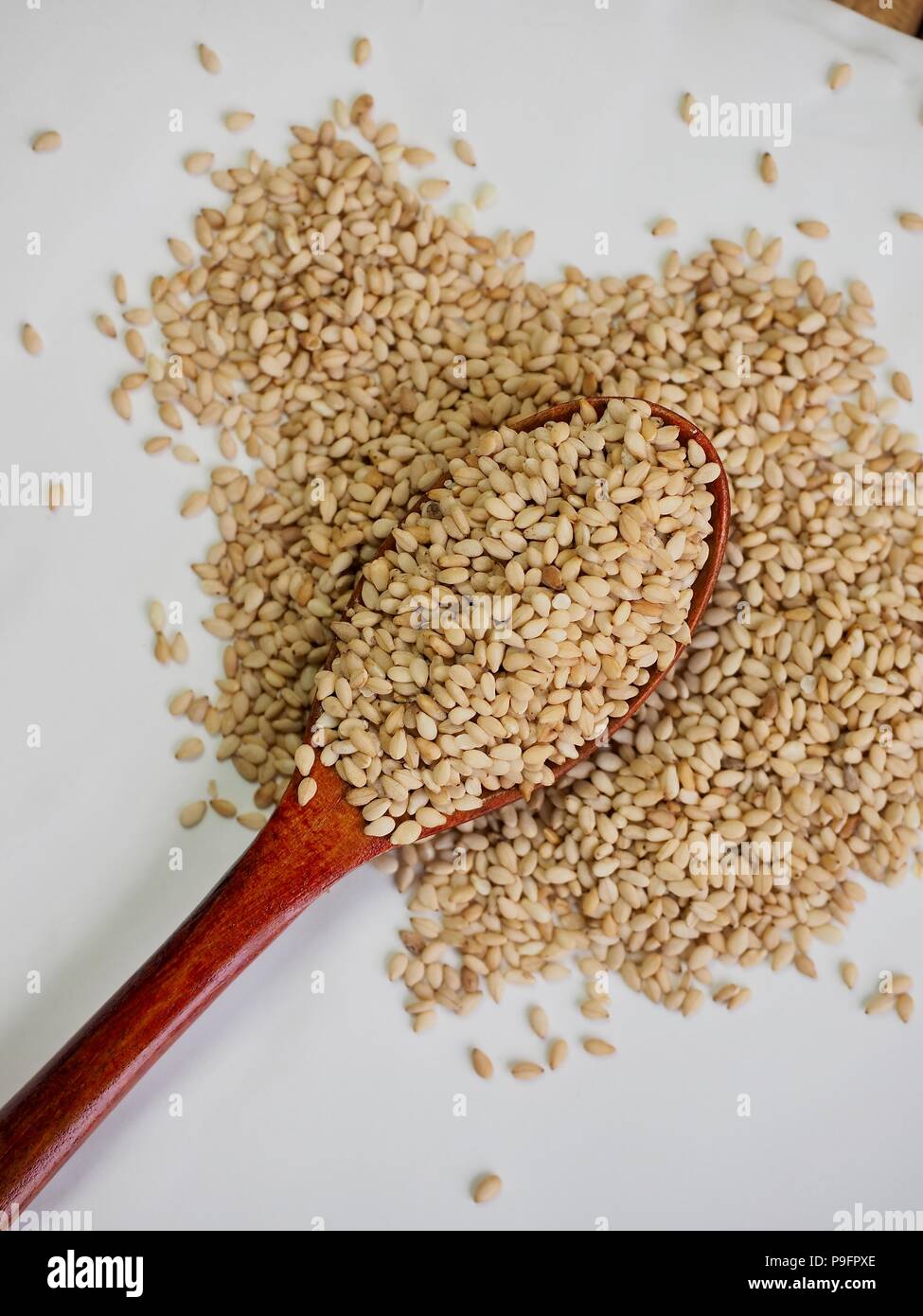 Sesame and spoon, Food Ingredients Stock Photo - Alamy