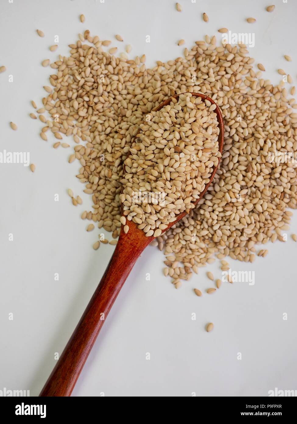 Sesame and spoon, Food Ingredients Stock Photo - Alamy
