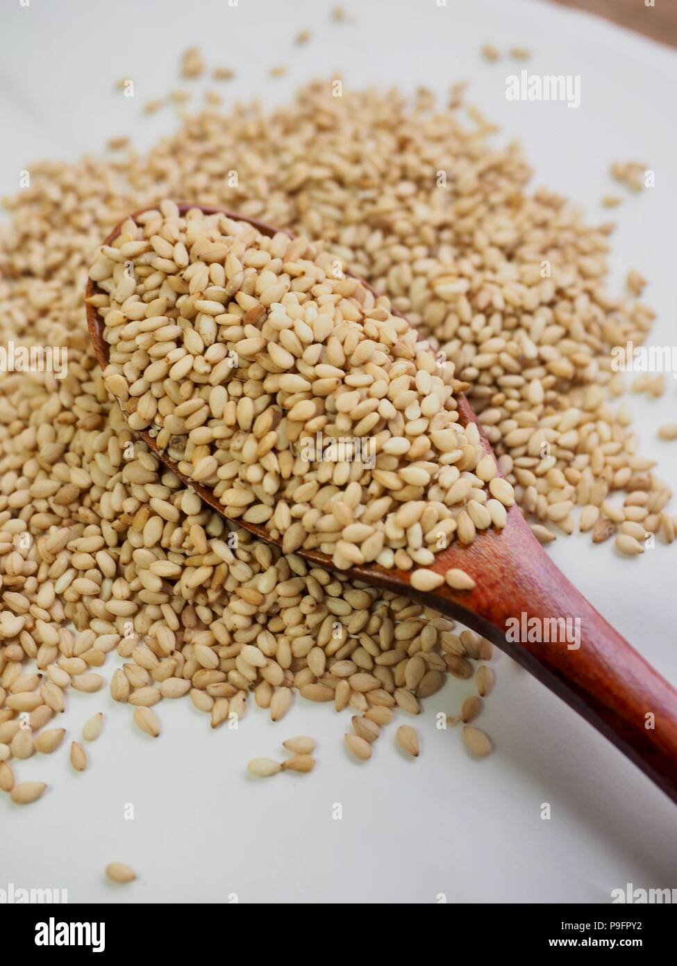 Sesame and spoon, Food Ingredients Stock Photo - Alamy