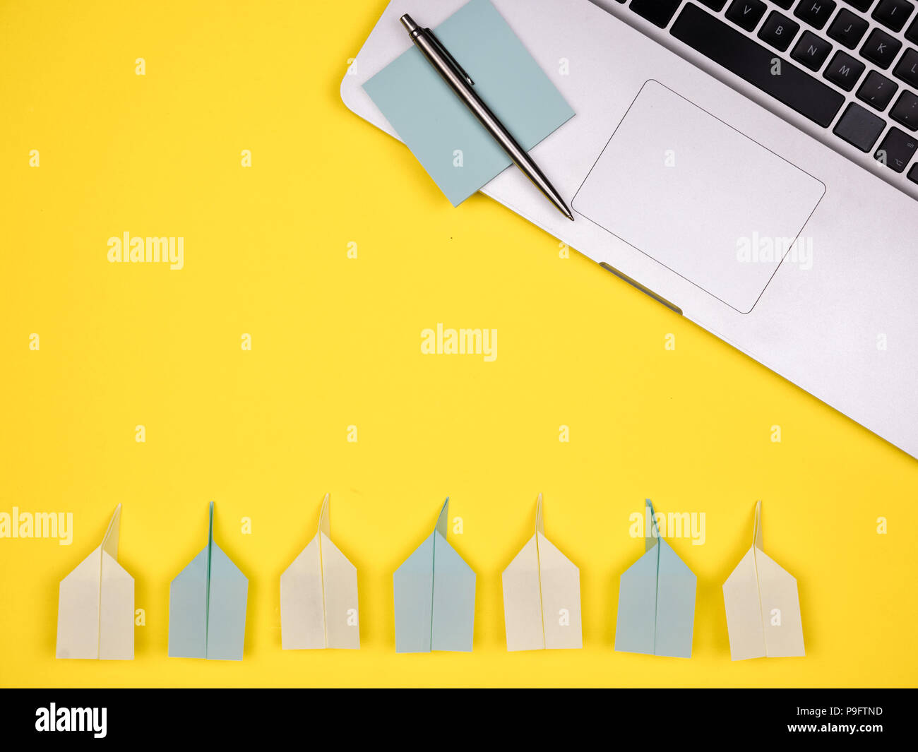Minimalistic office paper planes decorated Stock Photo - Alamy