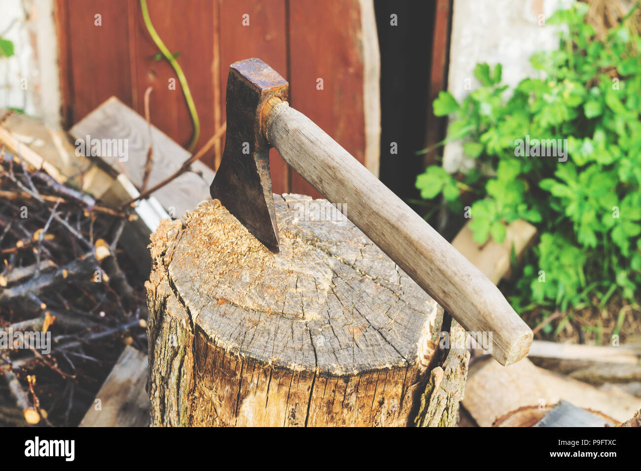 Old ax and log. Firewood cutting Stock Photo - Alamy