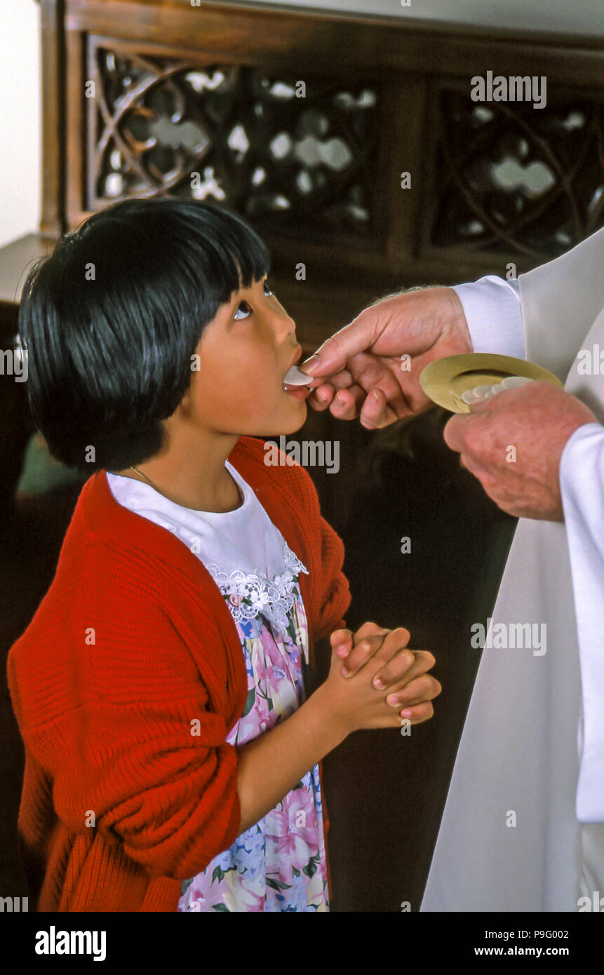 Catholic priest eucharist close up hi-res stock photography and images ...