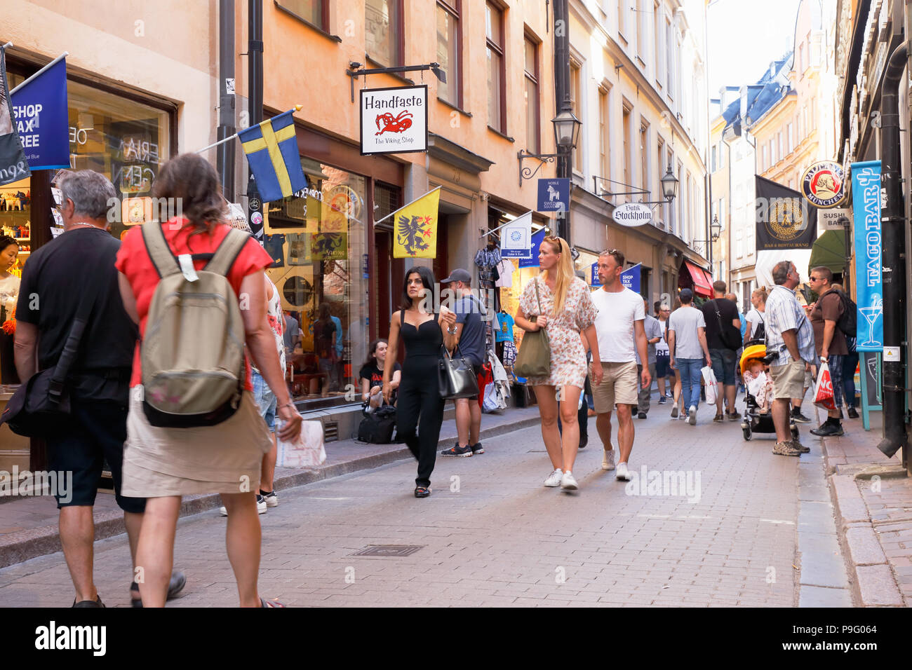 Stockholm, Sweden - July 12, 2018: People walking the Vasterlanggatan ...