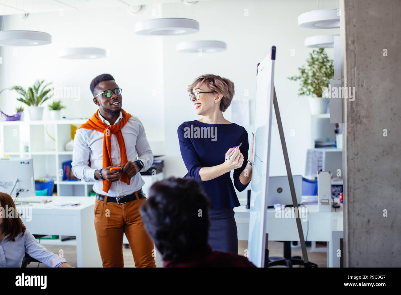 close up side view image of good-looking woman with fair hair teaching ...
