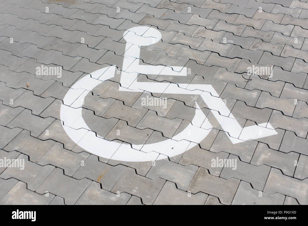 White sign for disabled people down Stock Photo - Alamy