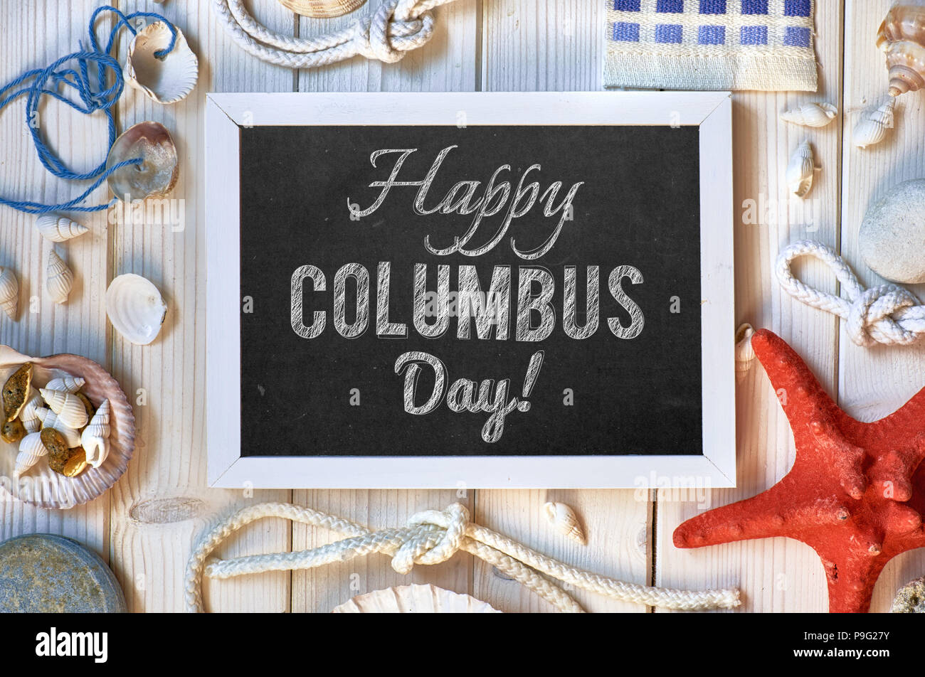 Blank blackboard with sea shells, rope, anchor and star fish on light ...