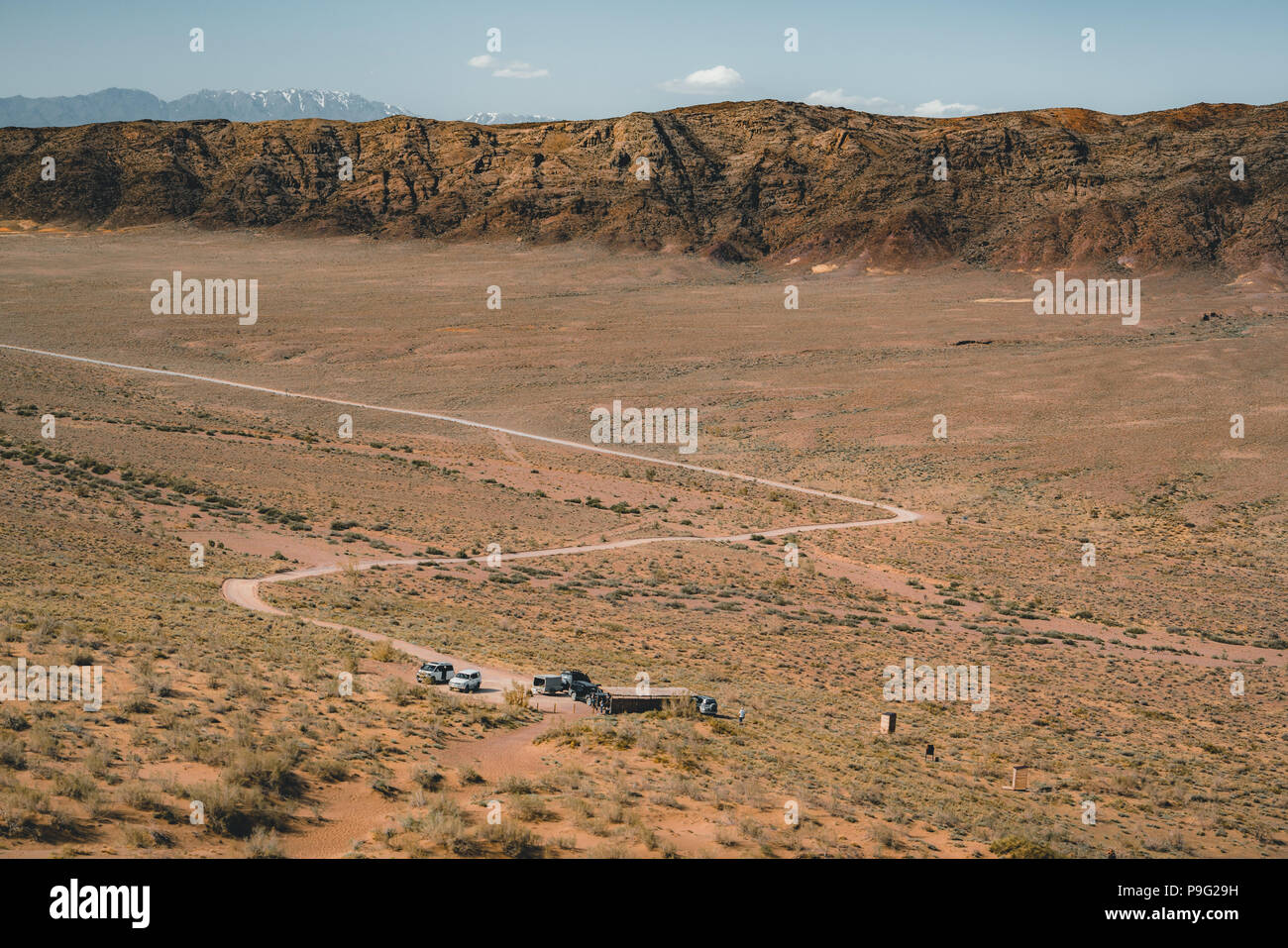 Sand dunes under blue sky. Sahara Desert, Previously, village houses ...