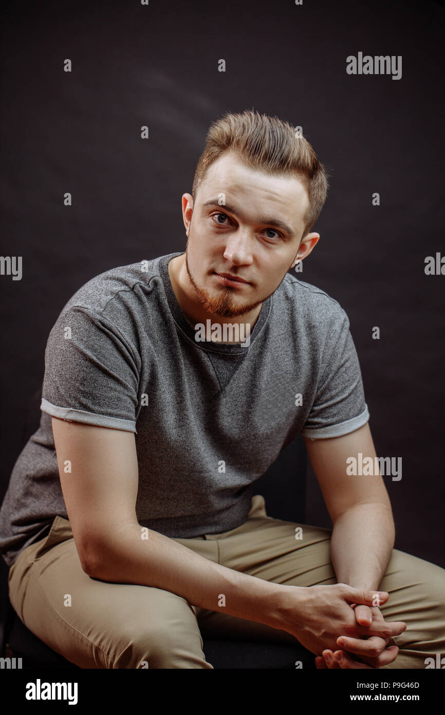 close up portrait of young good-looking male model in casual outfit ...