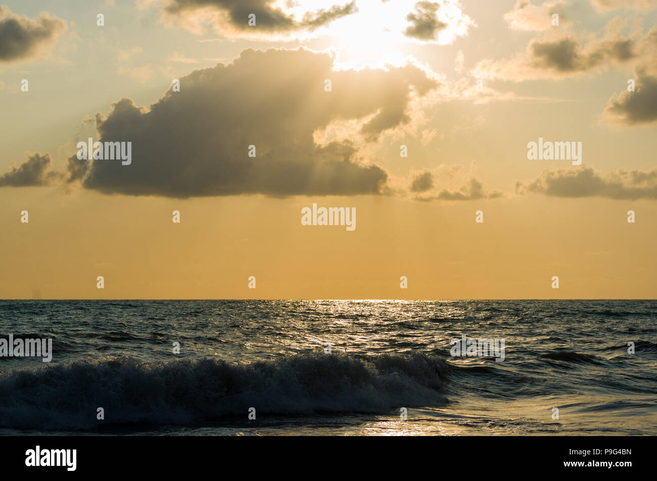 Summer sea sunset, the sun, waves and clouds, beautiful dramatic ...