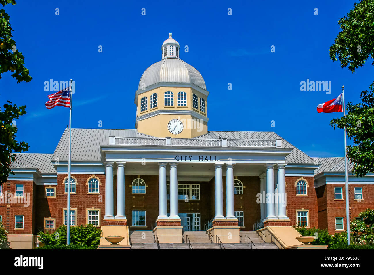 A Brick Classic City Hall with Dome and clock Tower Stock Photo - Alamy