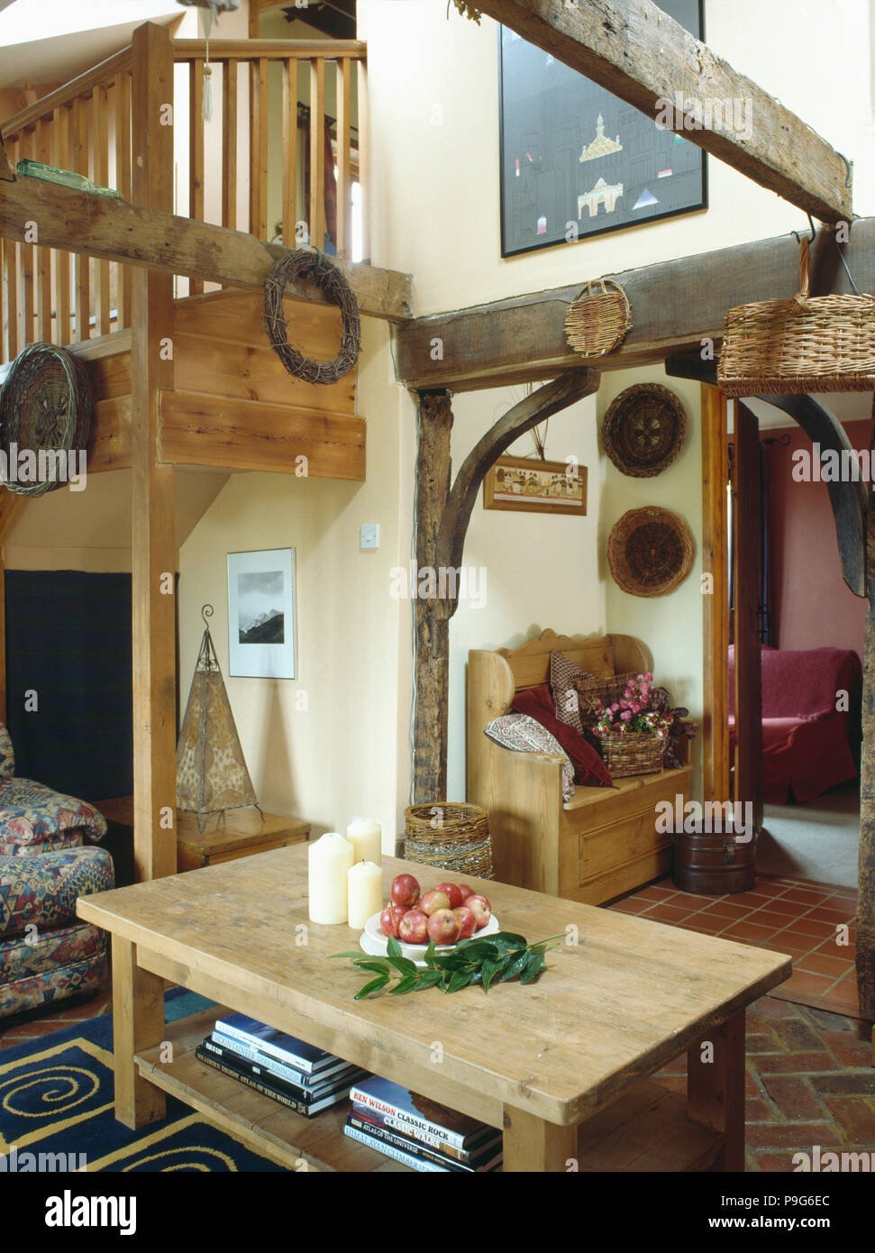 Pine table in country hall living room with exposed beams Stock Photo ...
