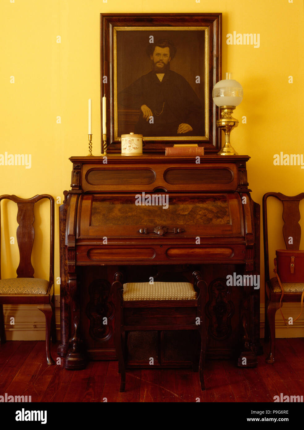 Oil portrait above old organ Stock Photo - Alamy