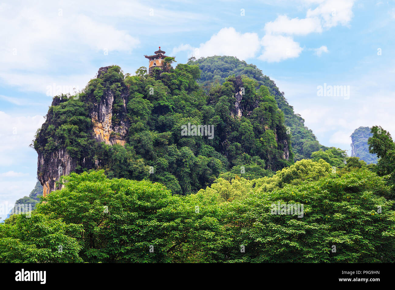 Landscapes of the Chinese province of Guangxi. Traditional building in ...