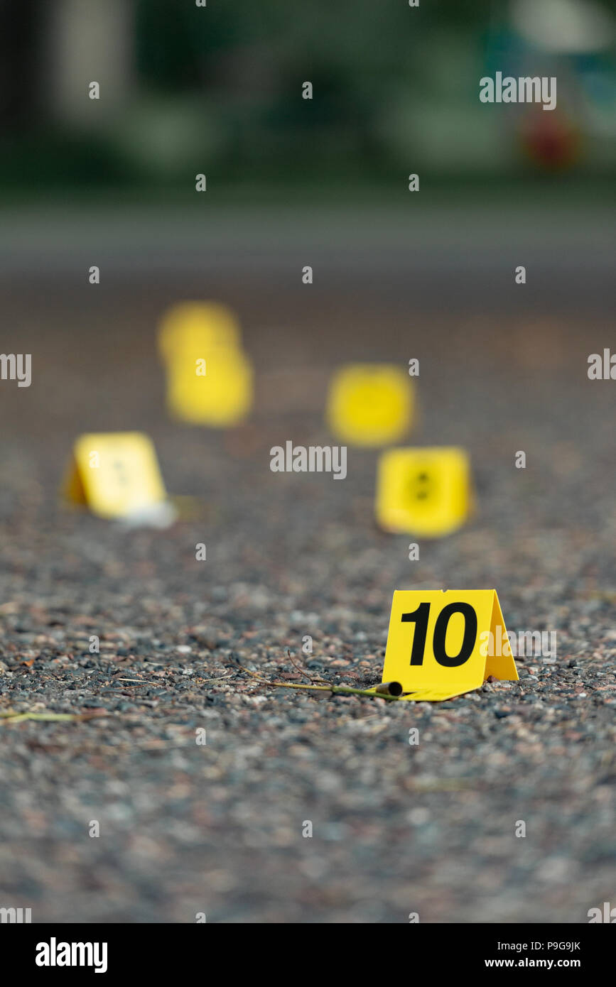 Crime scene markers on concrete with a shallow depth of field Stock ...