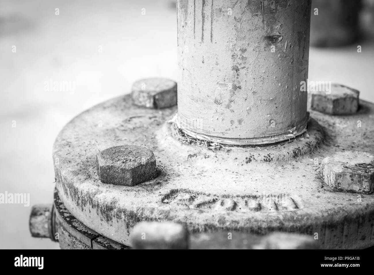 Rust bolt in coupling of industrial water pump. Old water pump with ...