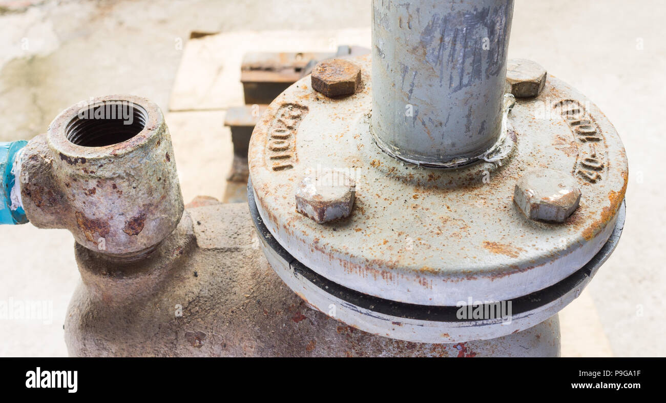 The Piping of Industrial Water Pump. Old water pump with rust bolt ...