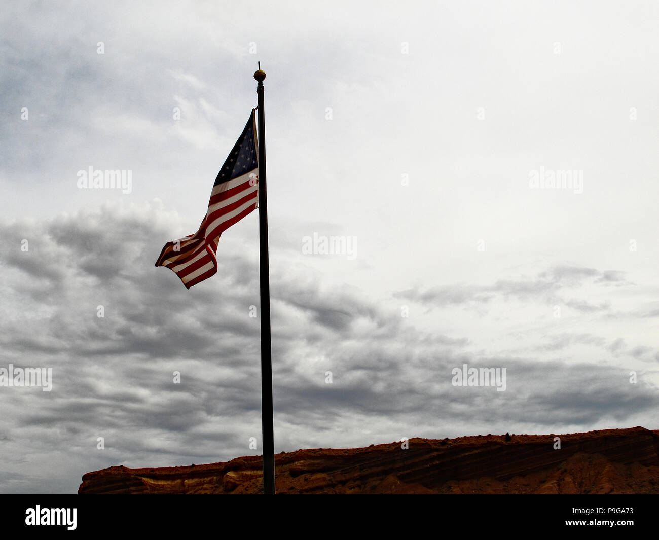 Flag of The United States of America Waving in the Breeze Before a ...