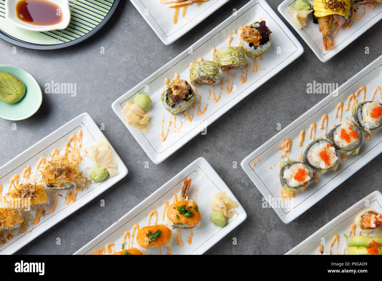various sushi roll flat lay shot Stock Photo - Alamy