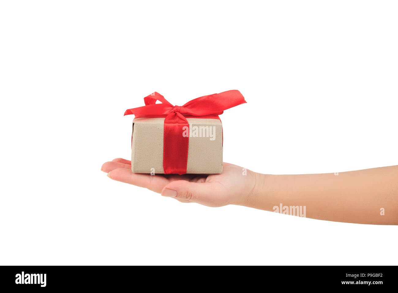 presentation of gift, hands giving a gift wrapped with red ribbon on ...