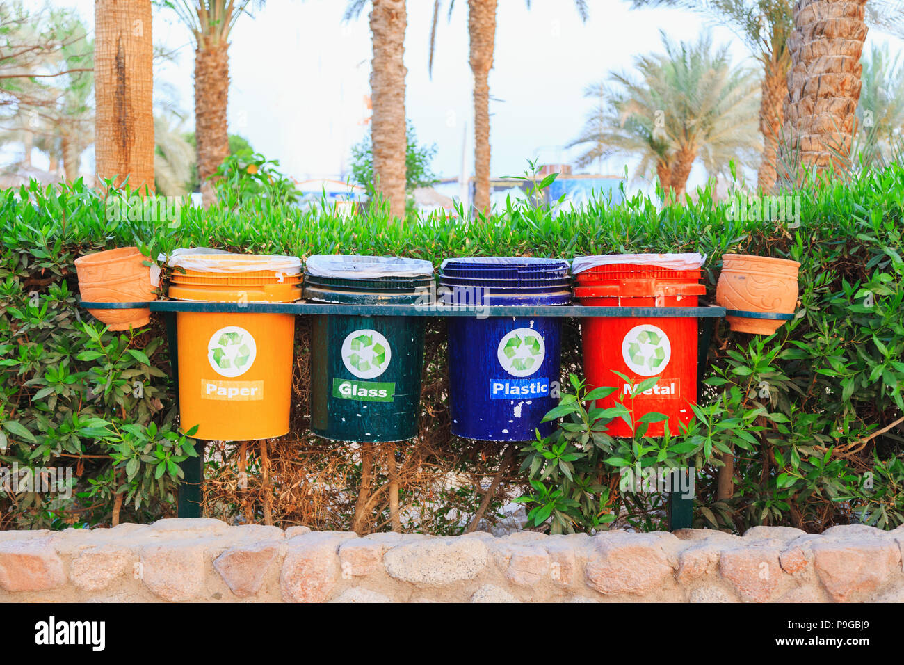 ecological concept, trash sorting, four color trash cans for paper ...