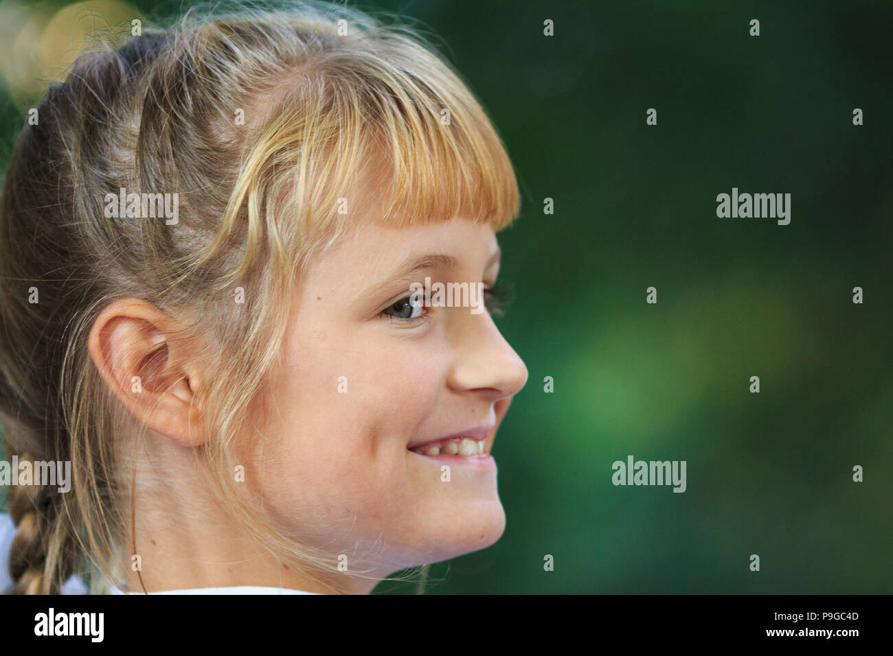 little girl's face closeup, kid's portrait, smiling child Stock Photo ...