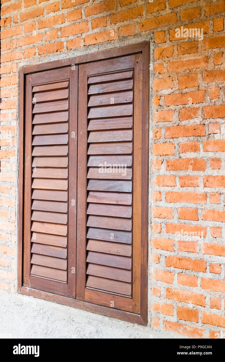 Brick wall building with light lamp, stock photo Stock Photo - Alamy