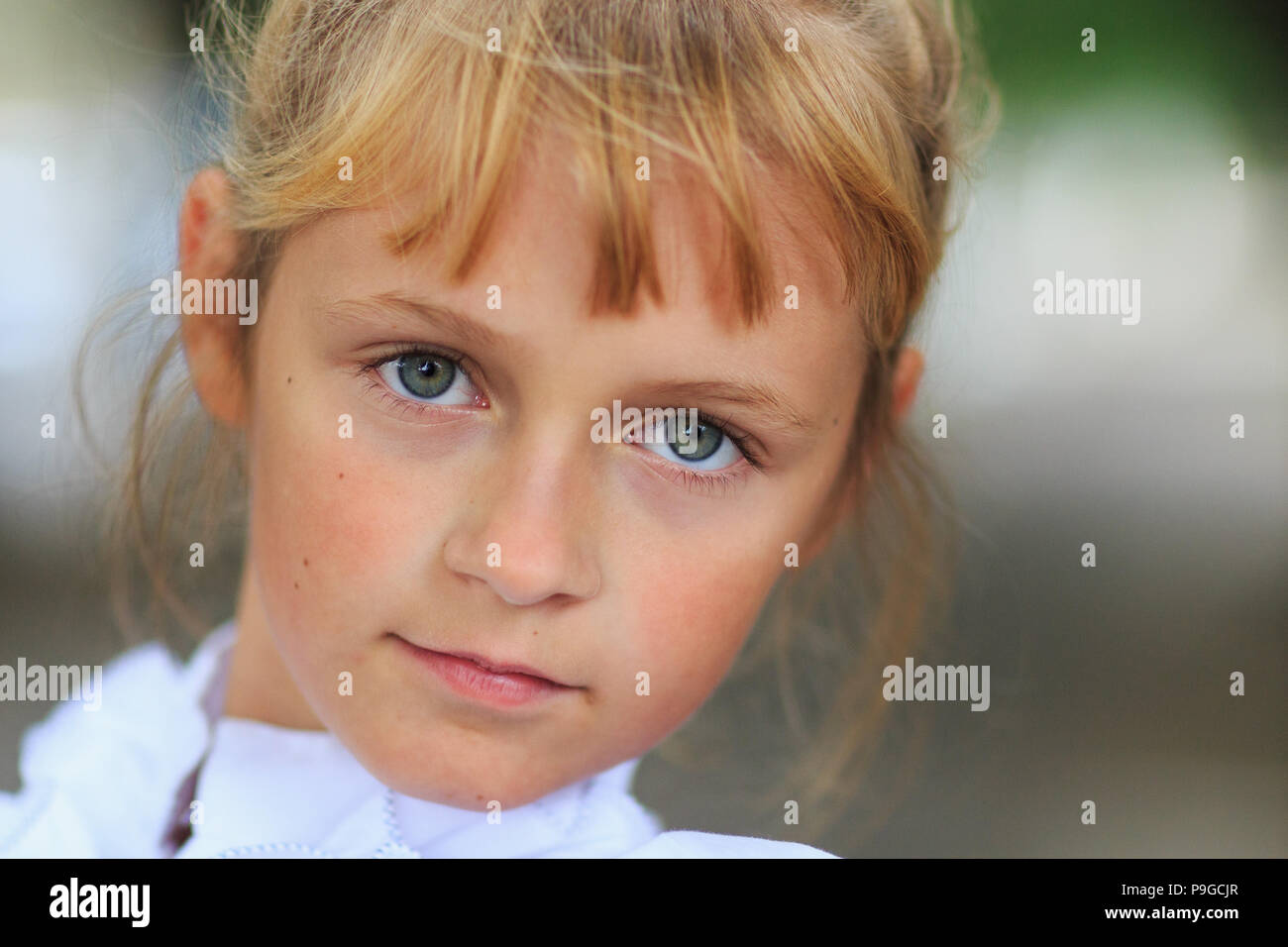 little girl's face closeup, kid's portrait, thoughtful or pensive child ...