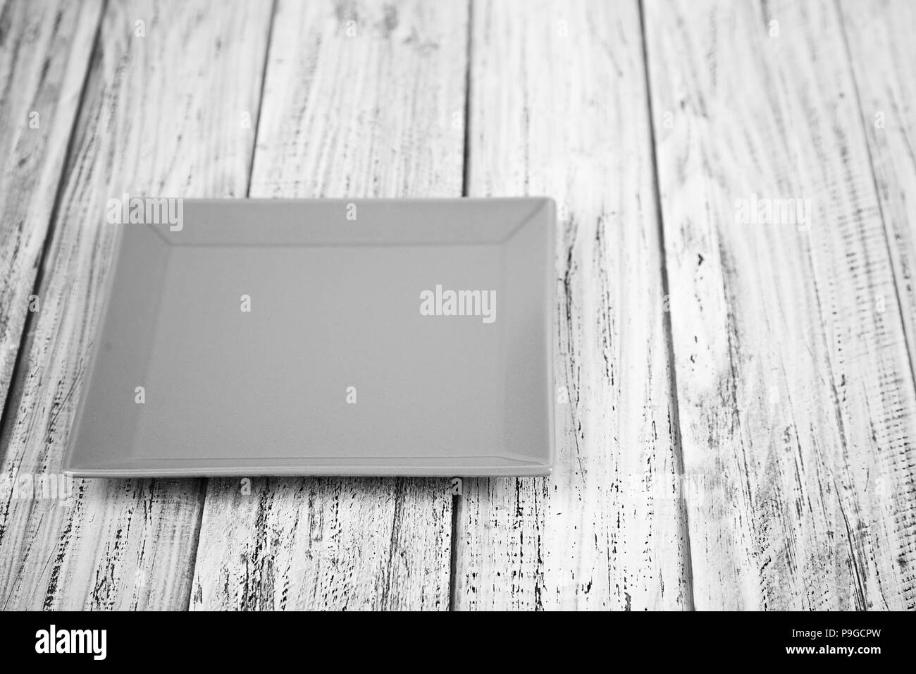 Square wood plate Black and White Stock Photos & Images - Alamy