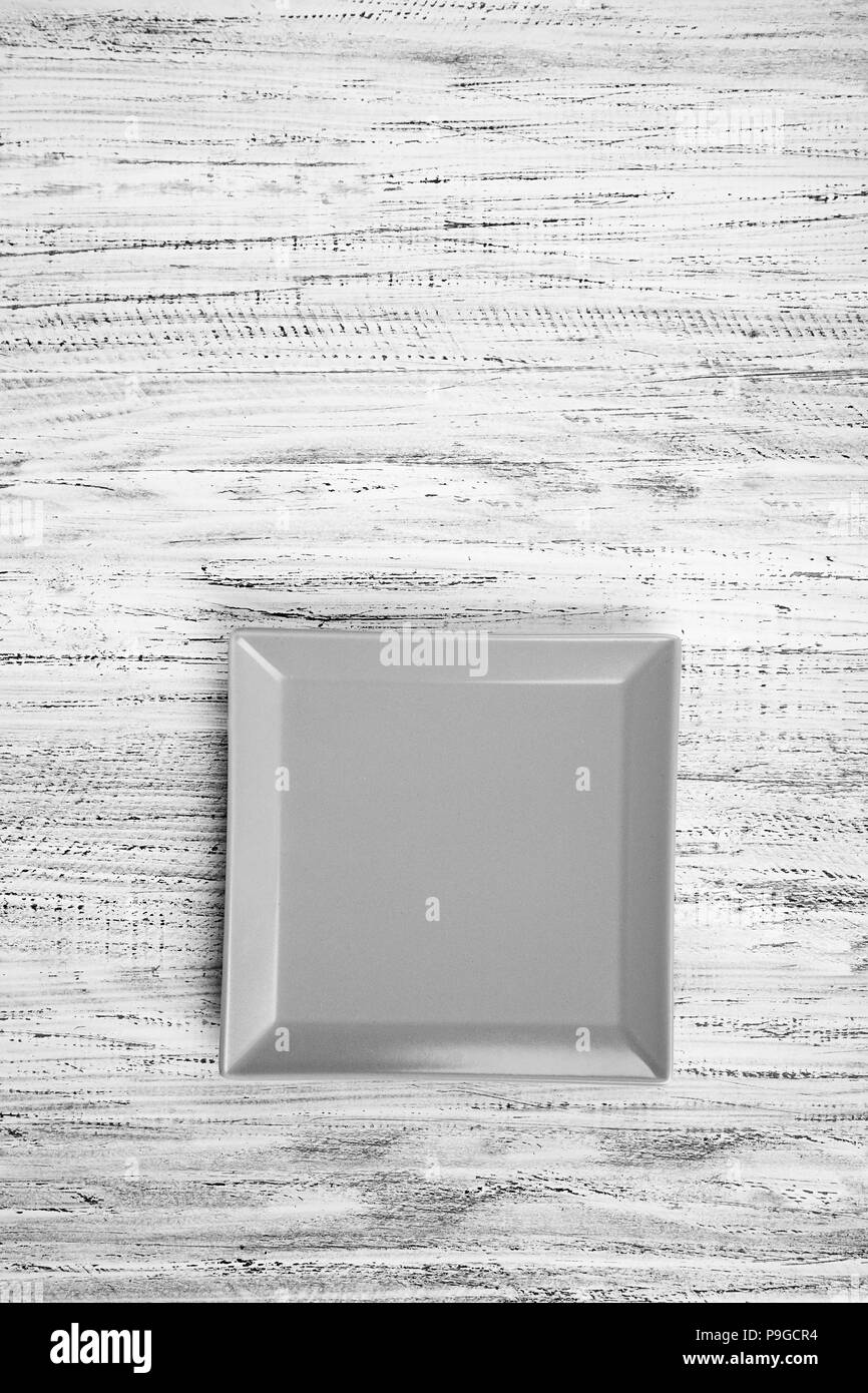 Empty wooden plate Black and White Stock Photos & Images - Alamy