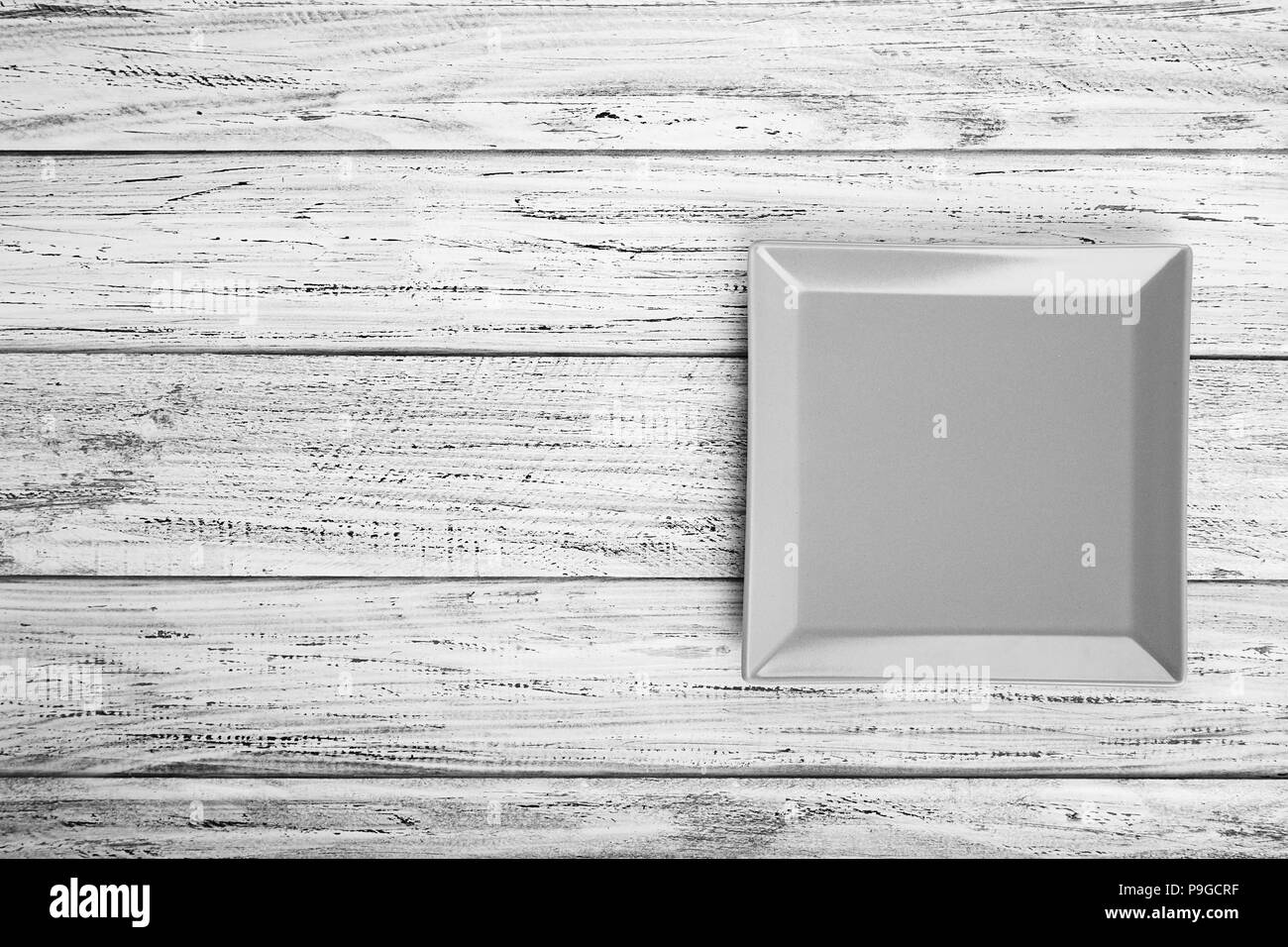 Square wood plate Black and White Stock Photos & Images - Alamy