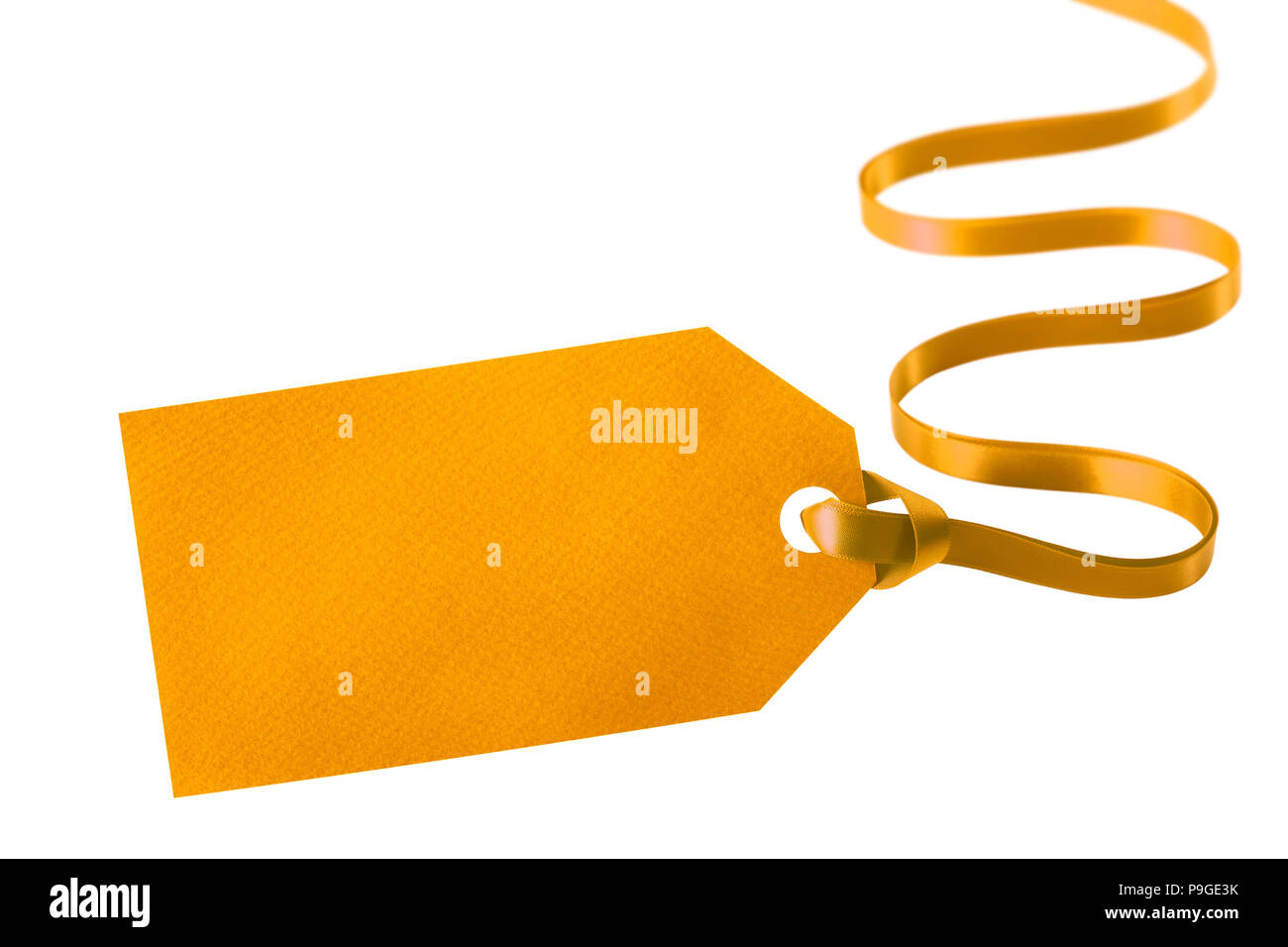 Gold gift tag tied with curly ribbon isolated on white Stock Photo - Alamy