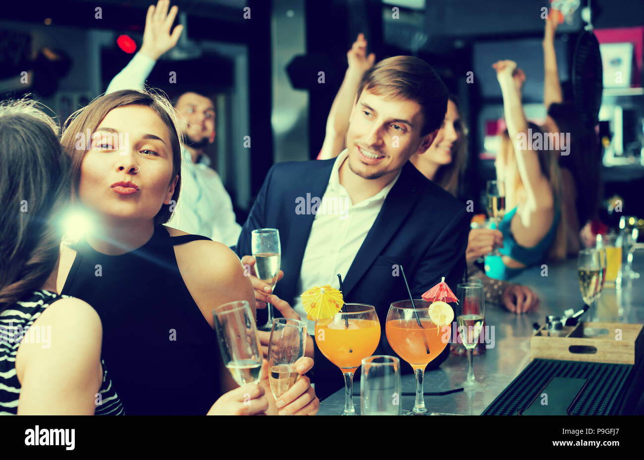 Meeting friends at the club at a party Stock Photo - Alamy
