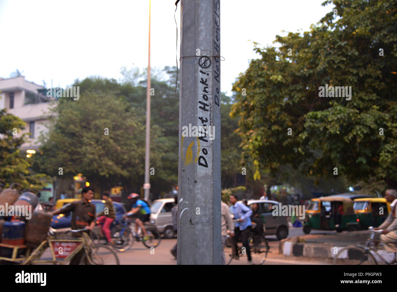 Amusing do not honk sign in Delhi India, photographed from a moving ...