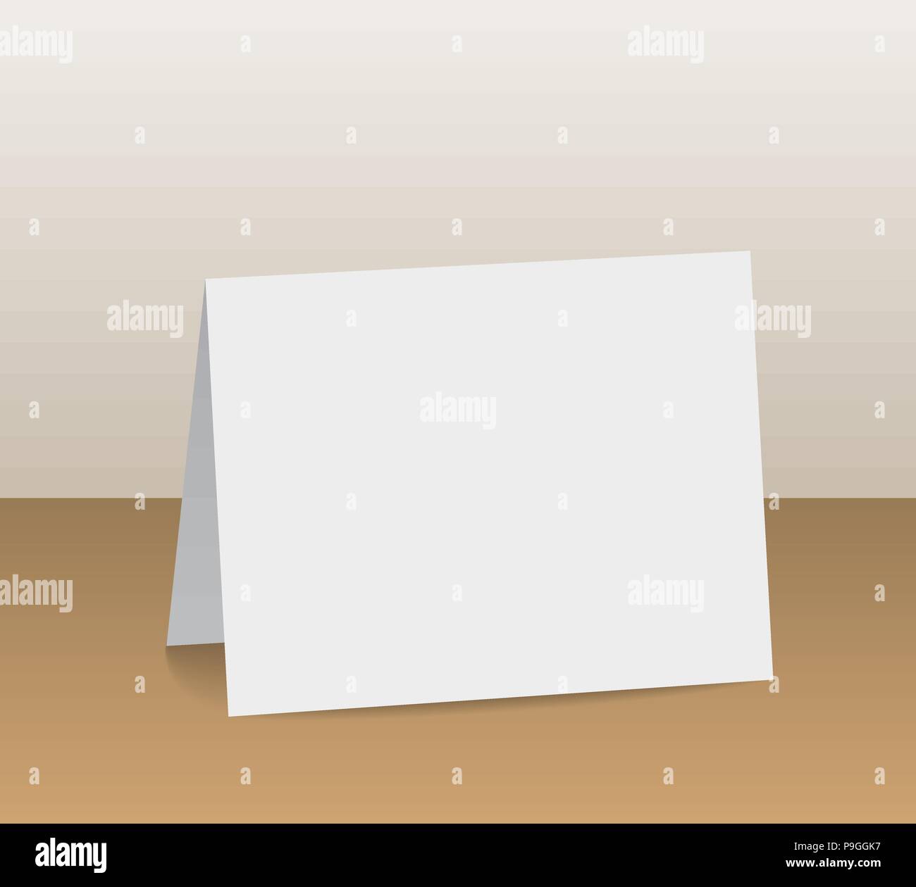 Realistic white blank folded paper card standing on wooden table top ...