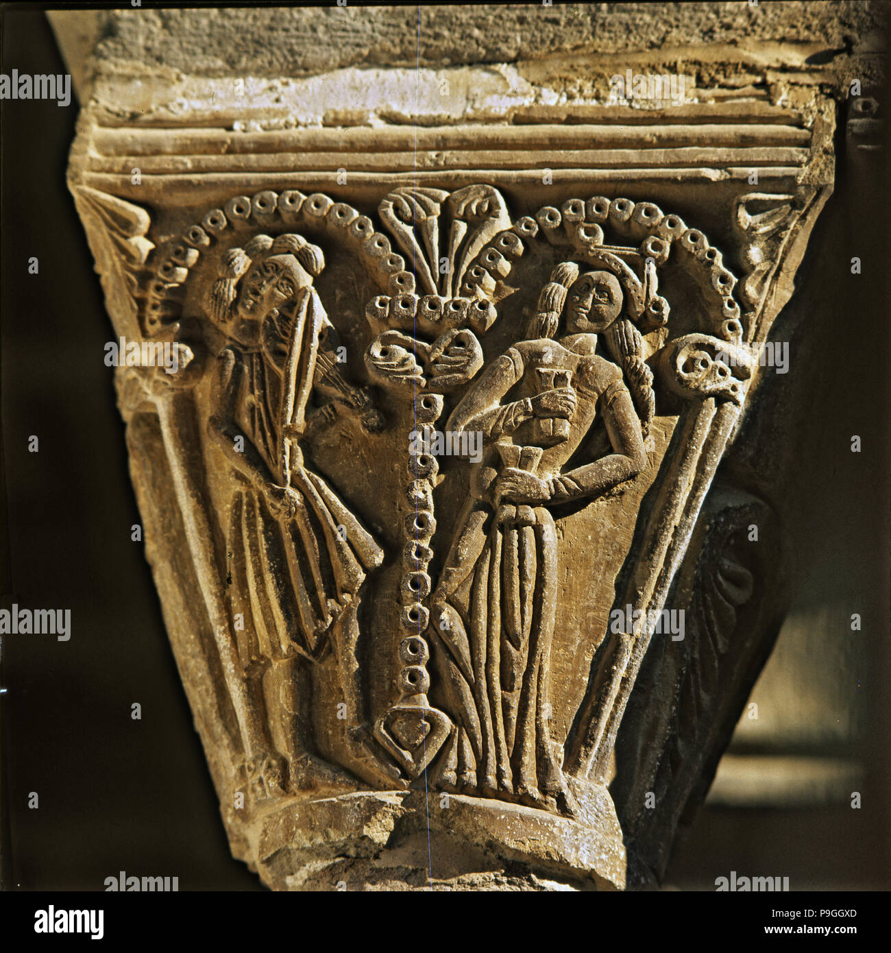 Musicians playing the rebec, figures in a capital of the cloister of ...